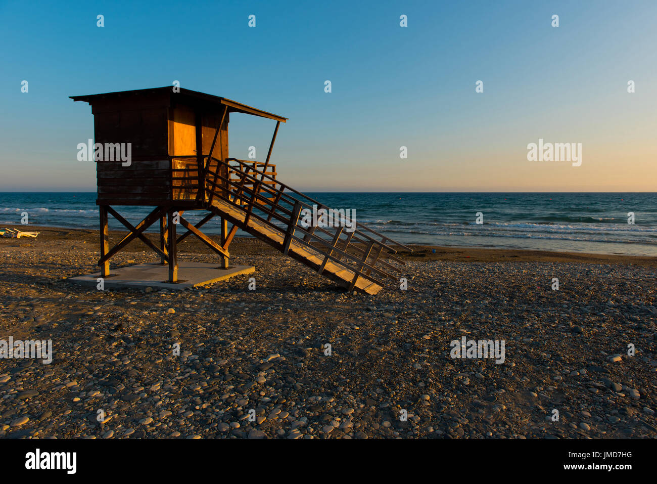 Baywatch tower on the beach. Lifeguard tower in the sunset Stock Photo ...