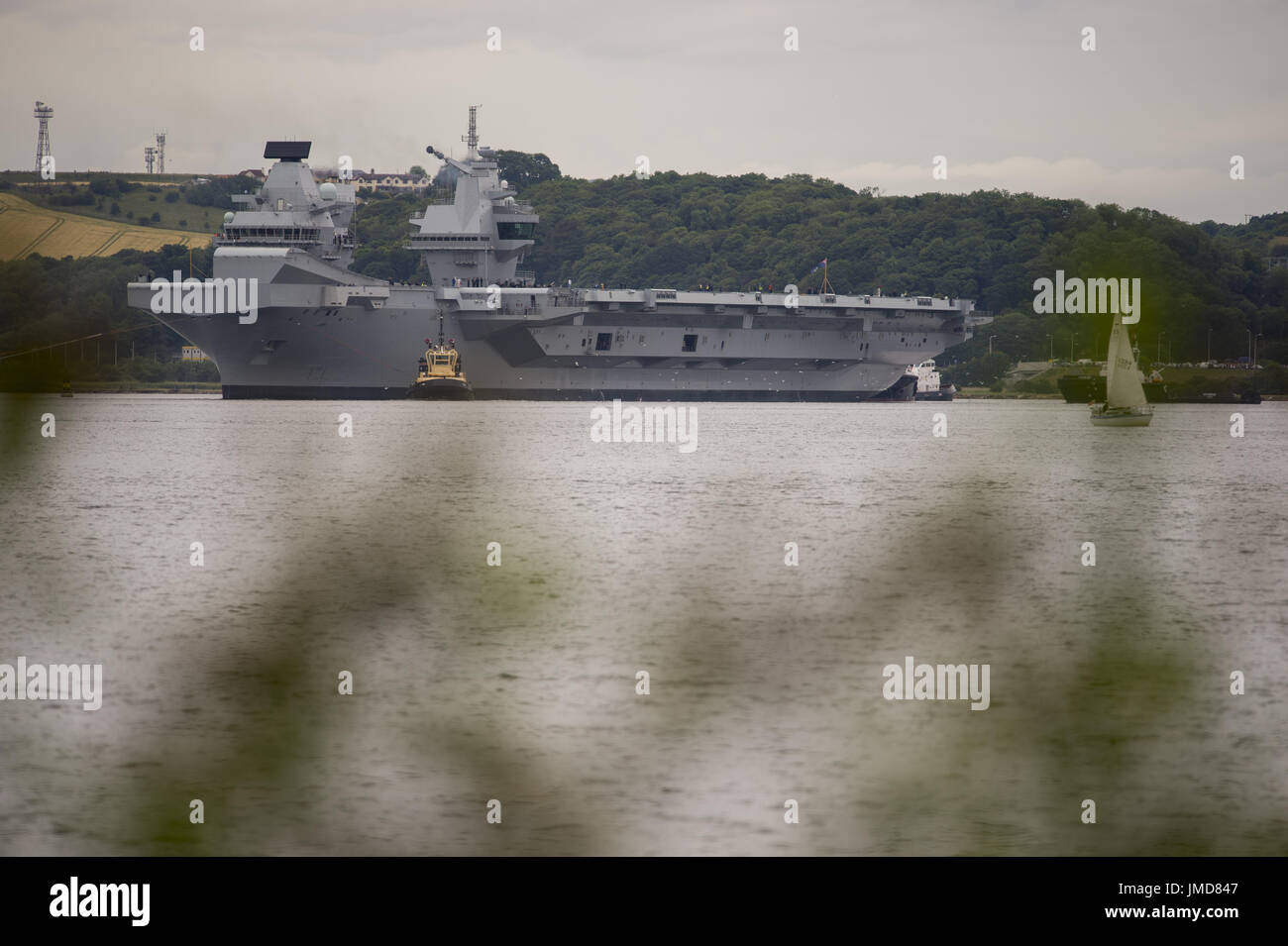 The HMS Queen Elizabeth turns in Rosyth Docks as it is due to set sail ...