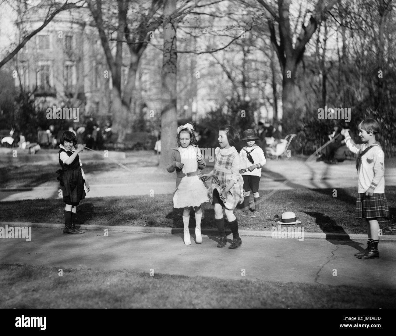 Vintage children jumping rope hi-res stock photography and images - Alamy