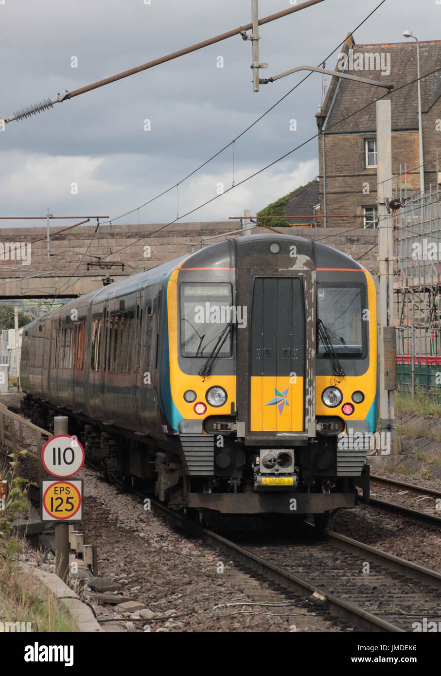Desiro class 350 electric multiple unit train passing through Carnforth ...