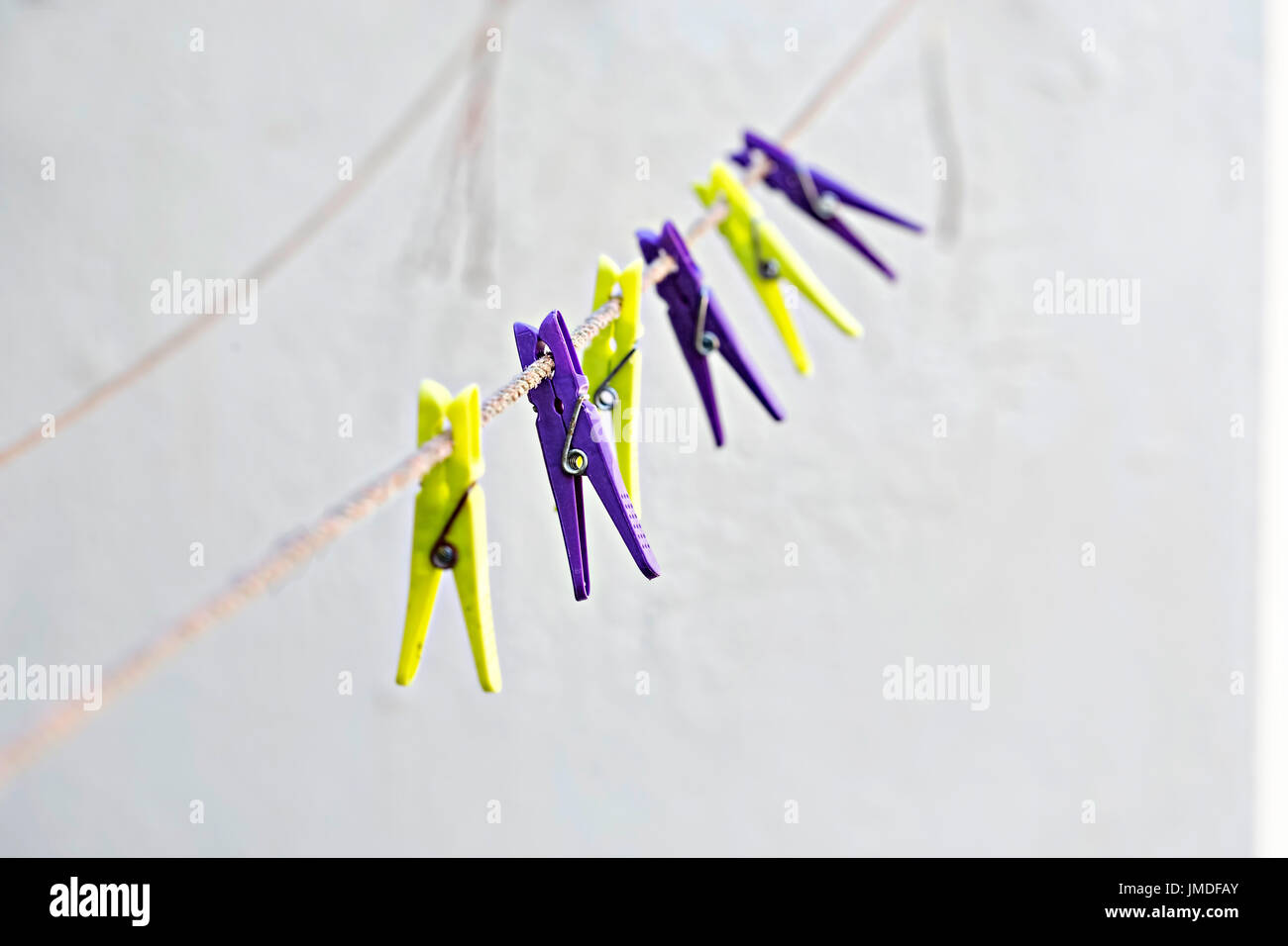 Clothes pin on clothes line Stock Photo - Alamy