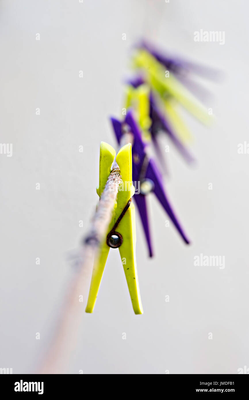 Clothes pin on clothes line Stock Photo - Alamy