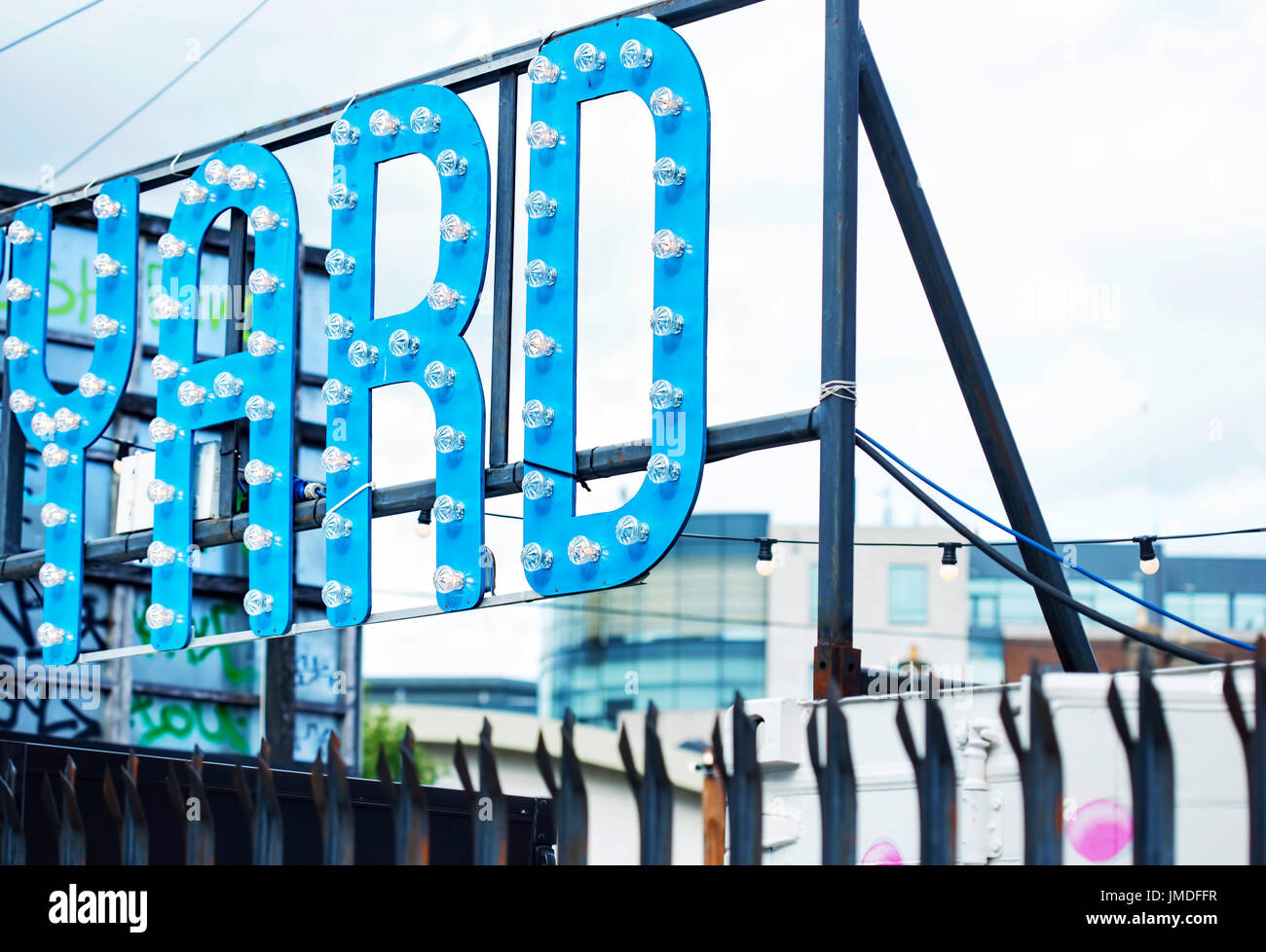 Blue "Yard" sign with lights Stock Photo - Alamy
