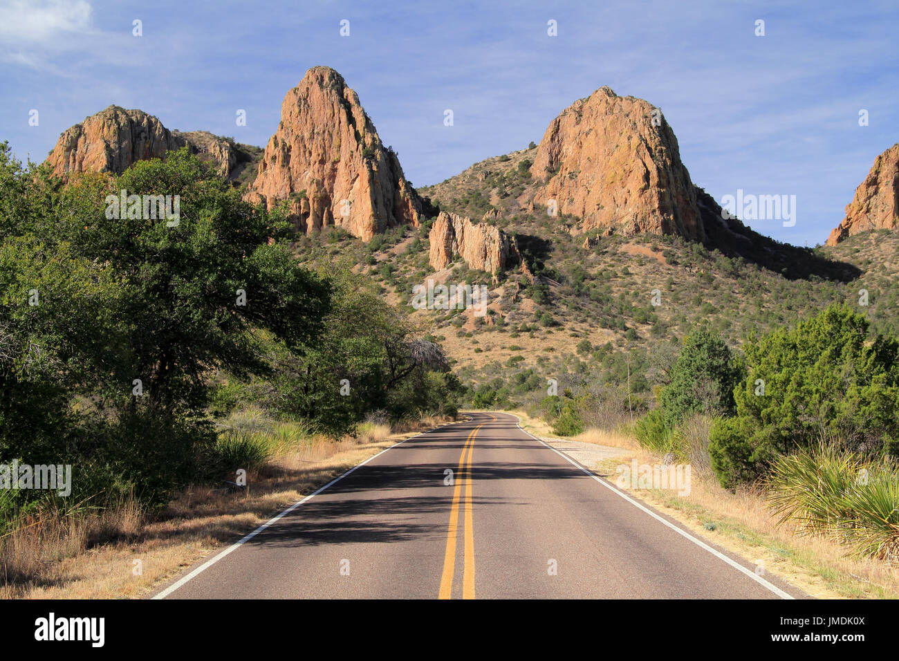 A scenic desert road cuts through the vast Big Bend National Park in ...