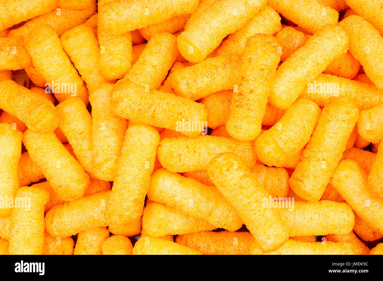 Cheese puff. Cheese puffs snack background texture food pattern Stock ...