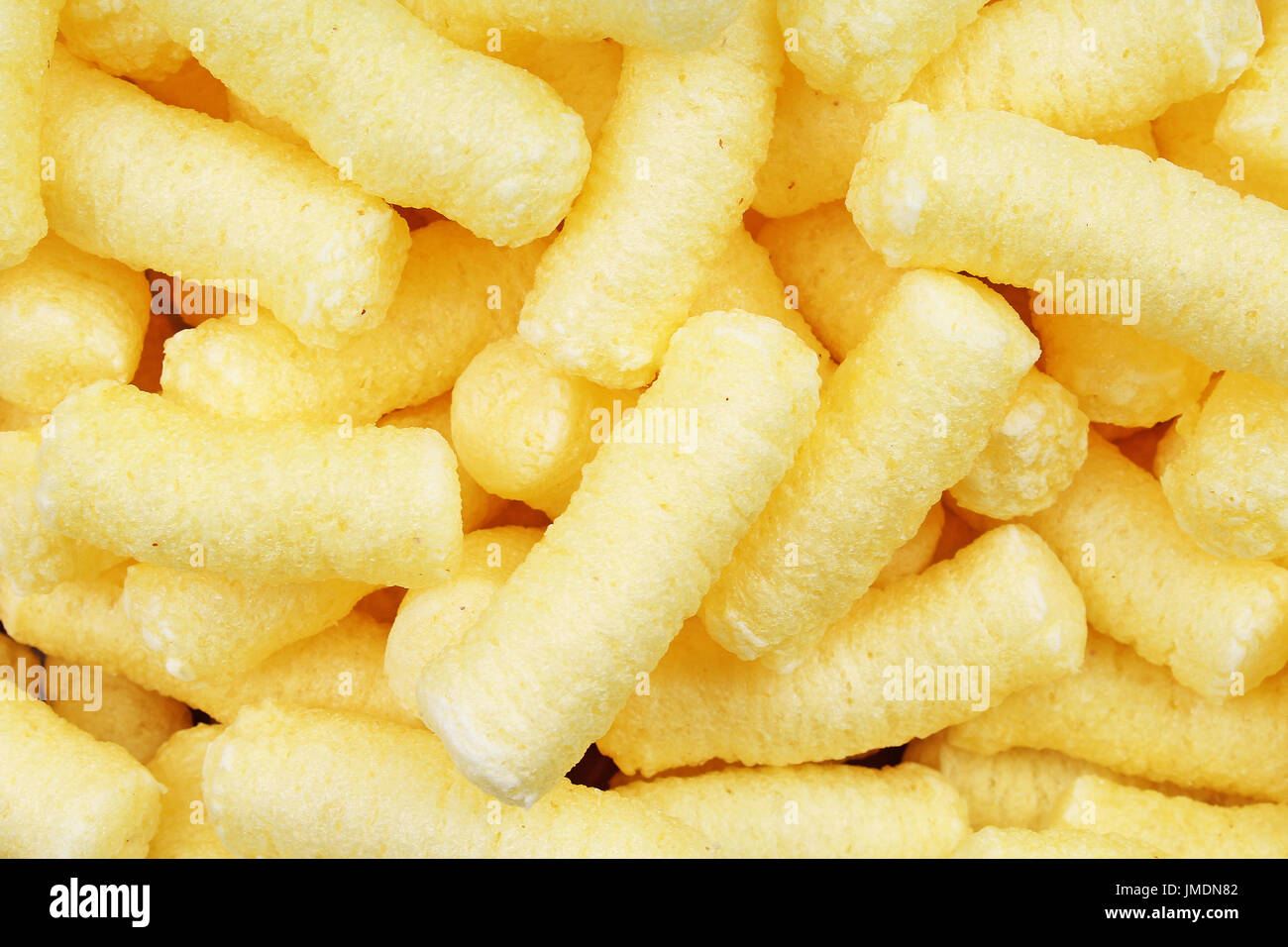 Cheese puff. Cheese puffs snack background texture food pattern Stock ...