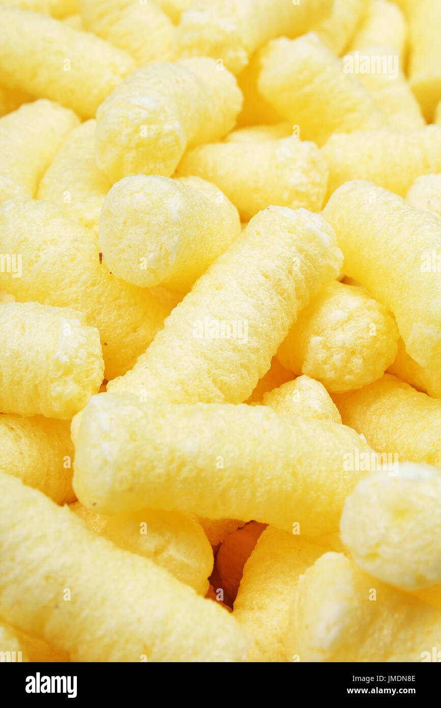 Cheese puff. Cheese puffs snack background texture food pattern Stock ...