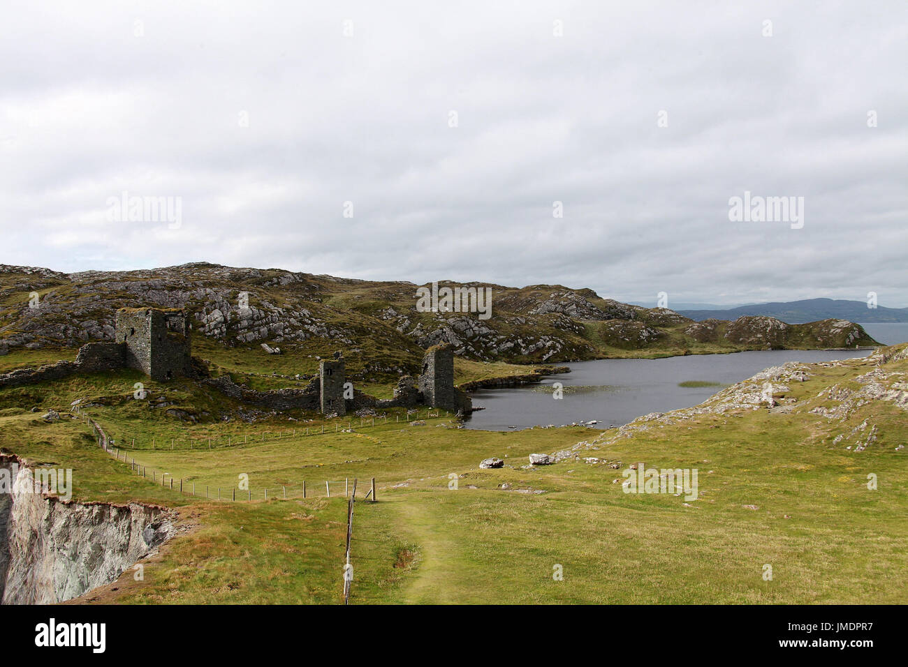 Dunlough Castle standing on the isthmus connecting Three Castle Head ...