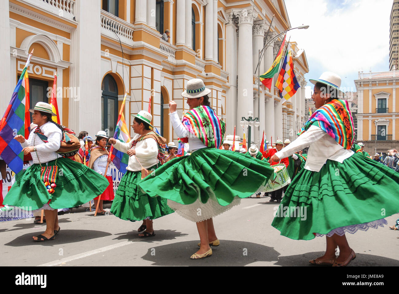 Bolivian people in colorful traditional costumes celebrating the ...