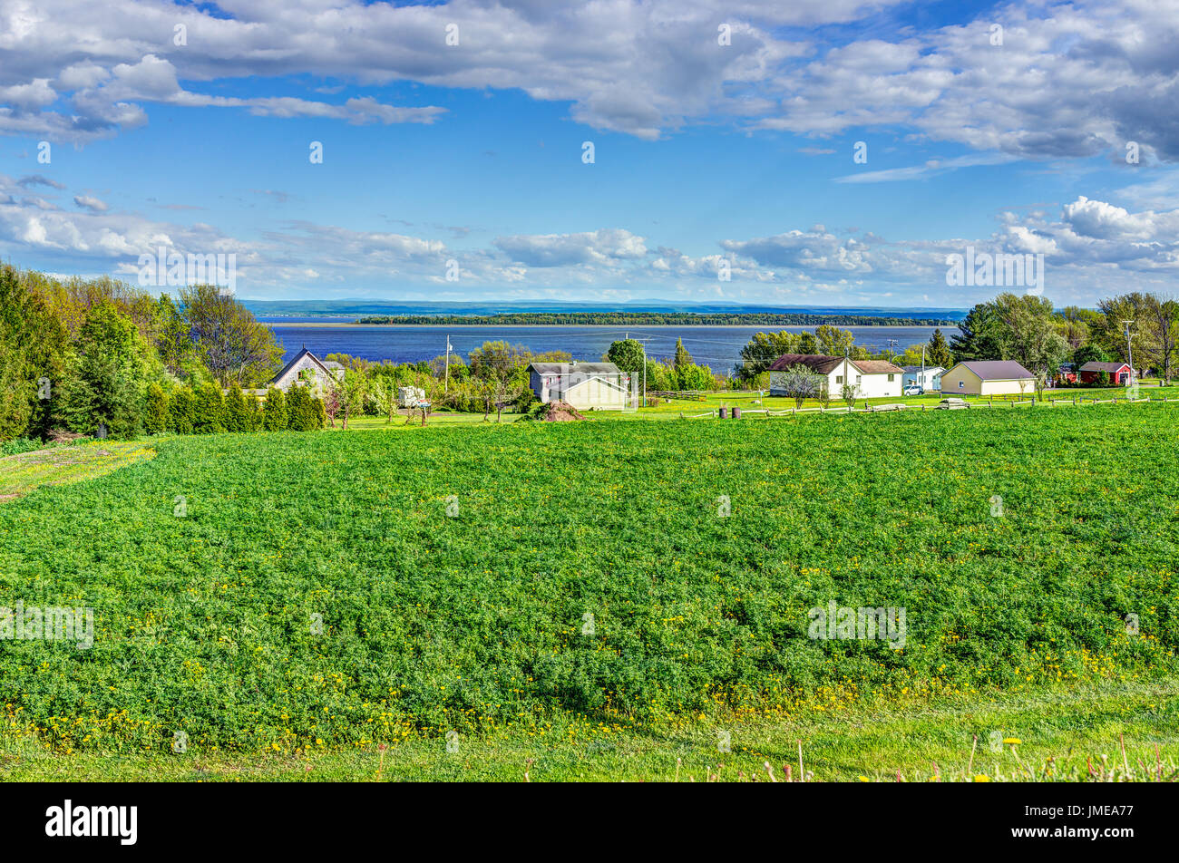 Cityscape landscape view of farmland in Ile D'Orleans, Quebec, Canada ...