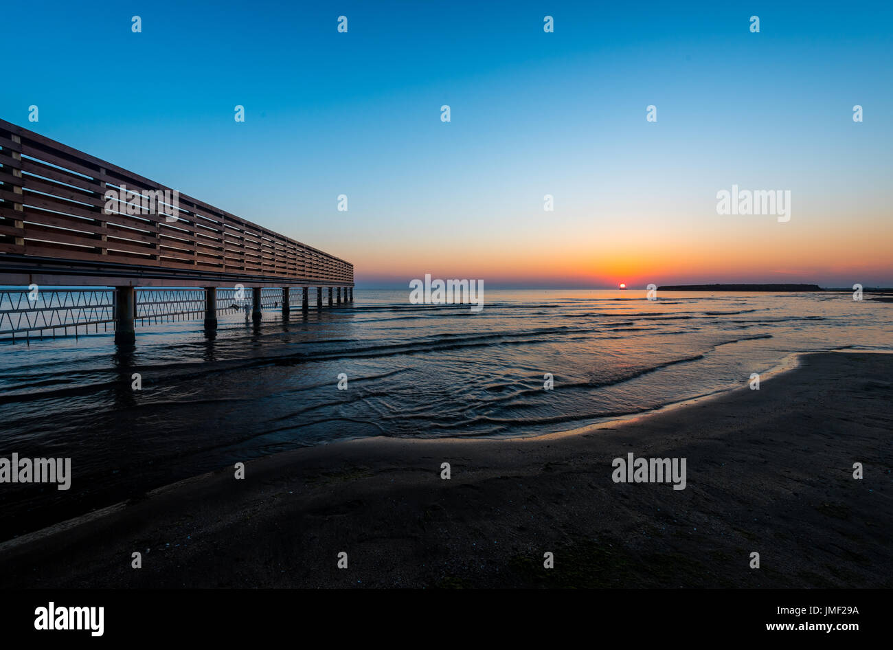 Bright colorful sunrise at sea Stock Photo - Alamy