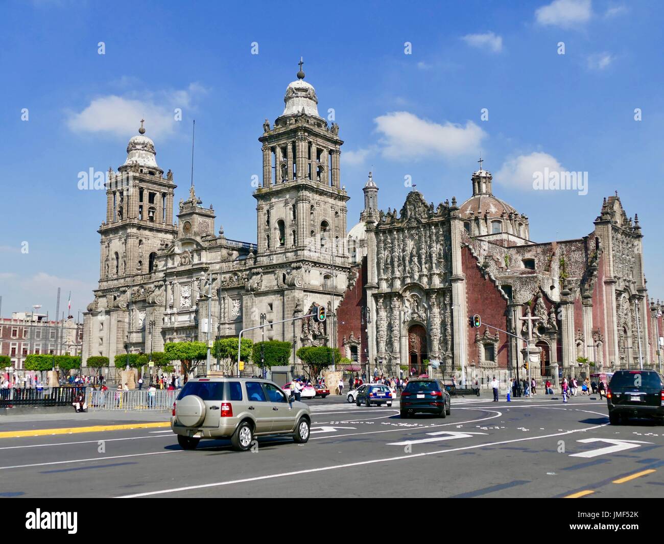 Mexico City Cathedral, traffic and crowds of pedestrians in the area ...
