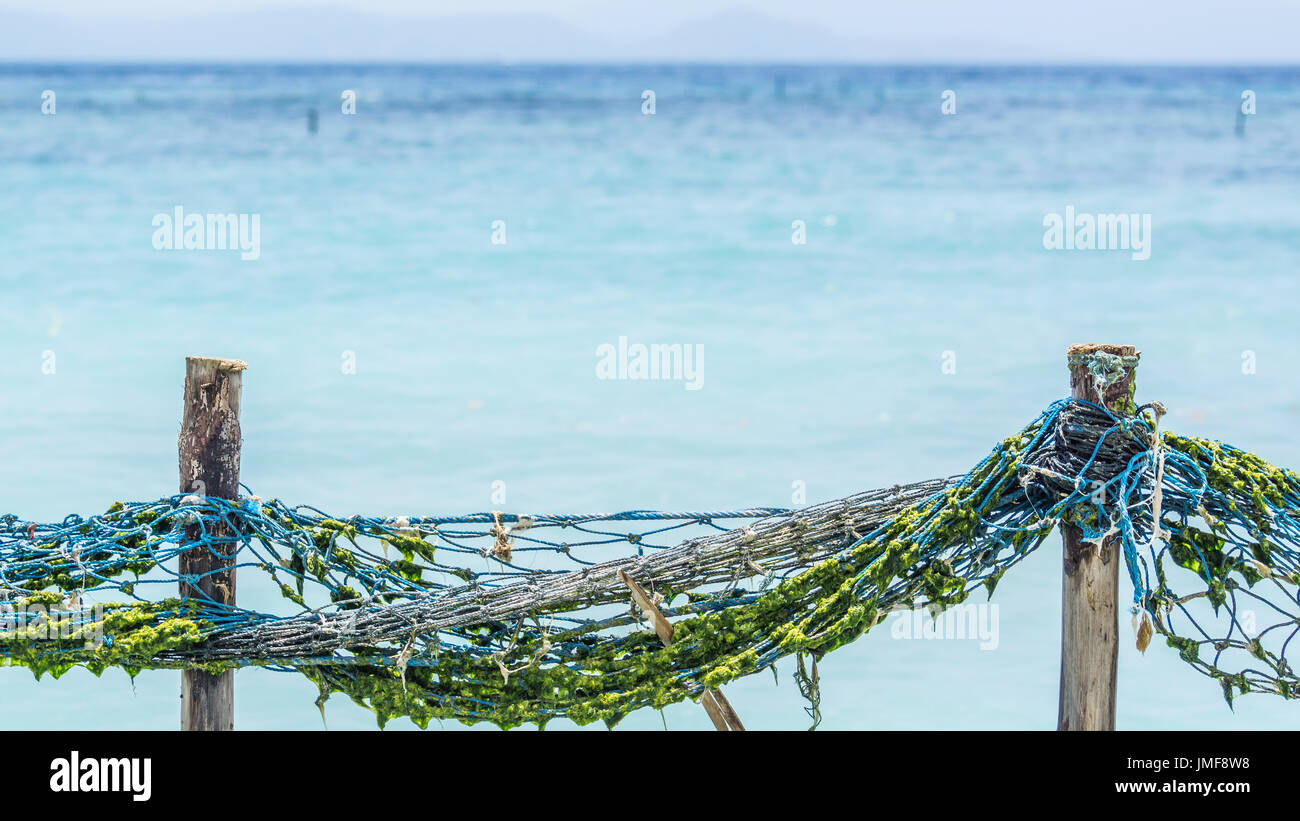 Fishing nets and turquoise sea of a tropical island perfect for ...