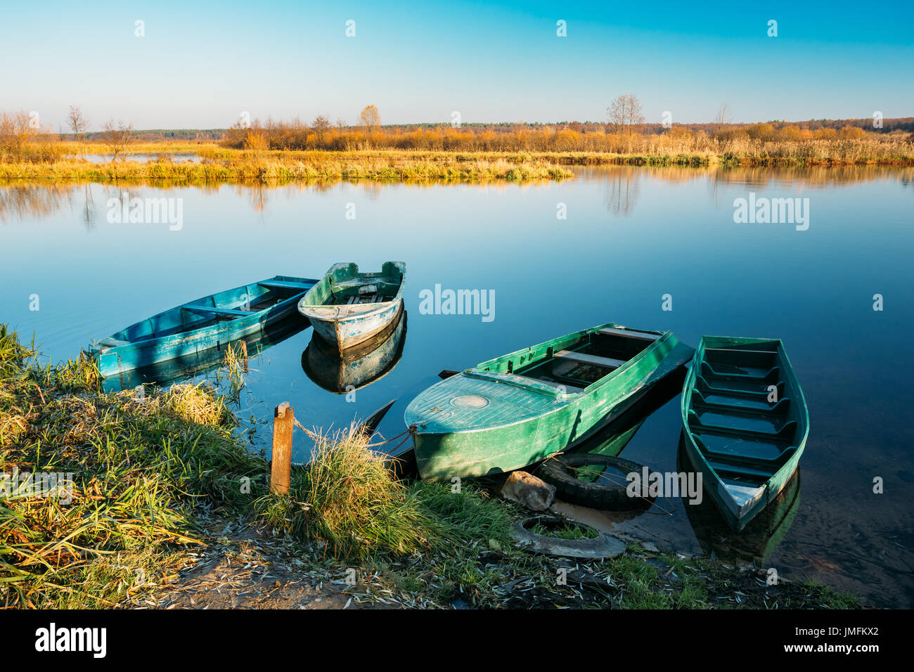 Fall River Landscape Of Four Tied Up To The Bank Of River Old Wooden ...