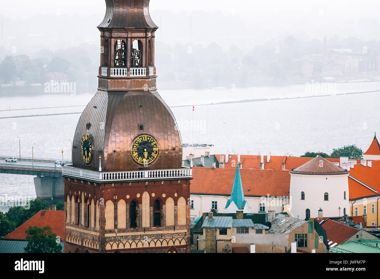 Tower Of Riga Dome Cathedral On Cityscape Background In Riga, Latvia ...