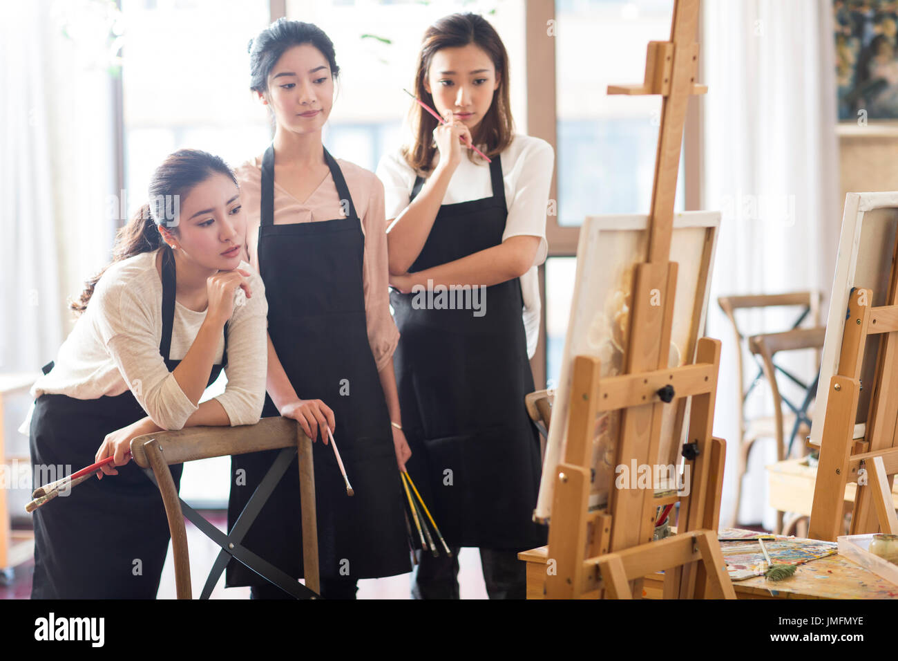 Female friends painting hi-res stock photography and images - Alamy