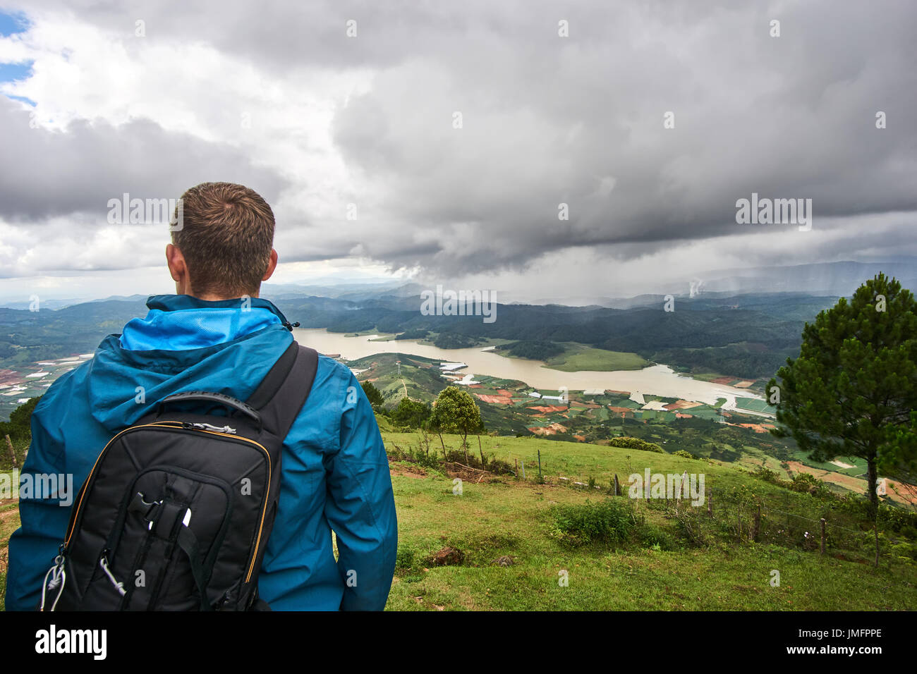Man standing in rain hi-res stock photography and images - Alamy