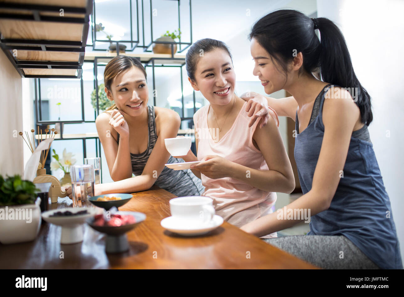 Best female friends drinking coffee Stock Photo - Alamy