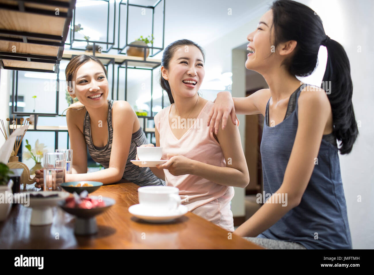 Best female friends drinking coffee Stock Photo - Alamy