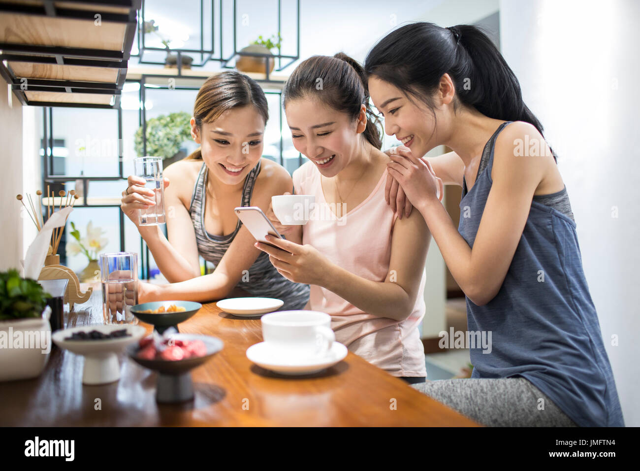 Best female friends drinking coffee Stock Photo - Alamy