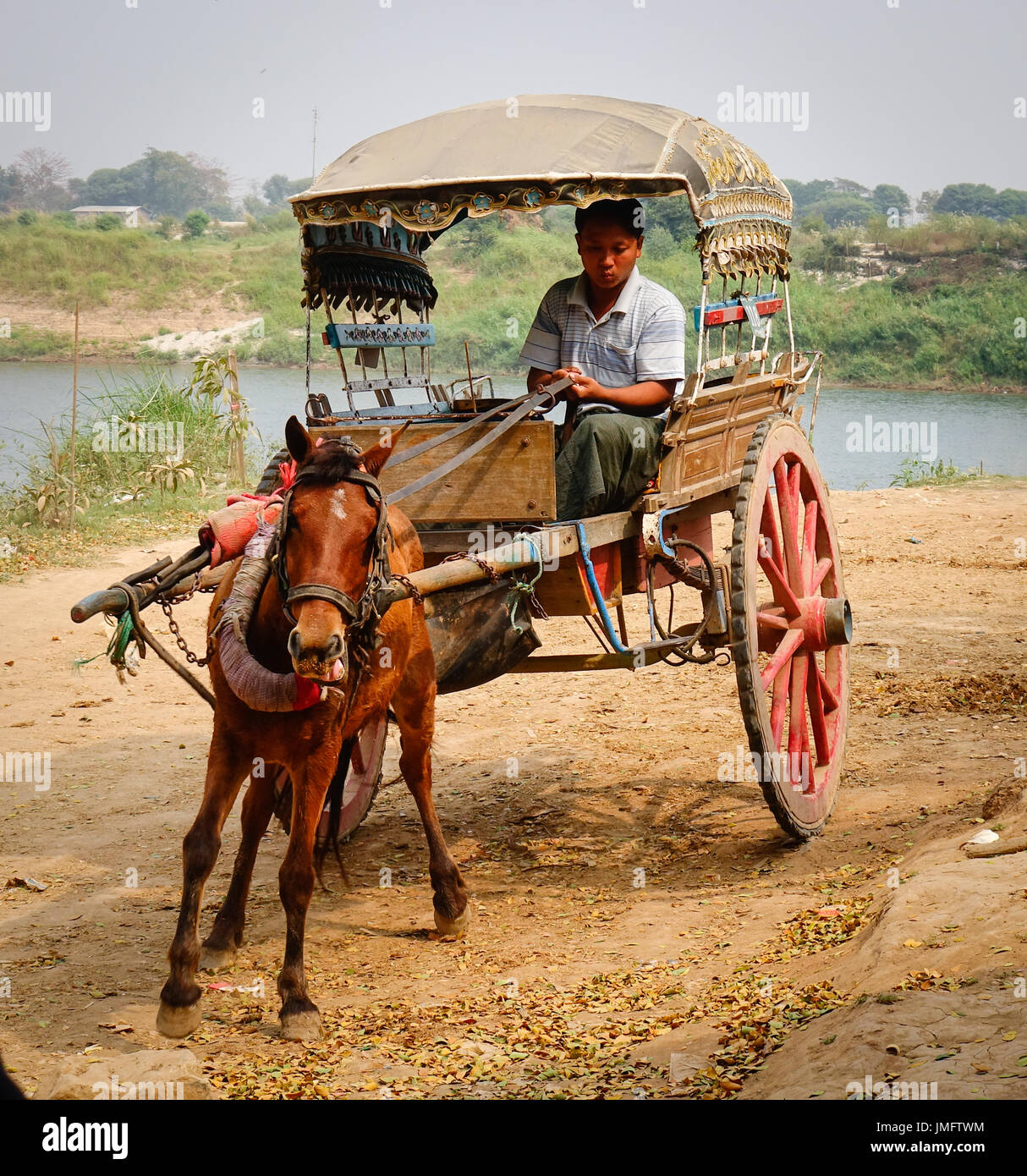 Mandalay, Myanmar - Feb 22, 2016. Horse cart at Innwa Town in Mandalay ...