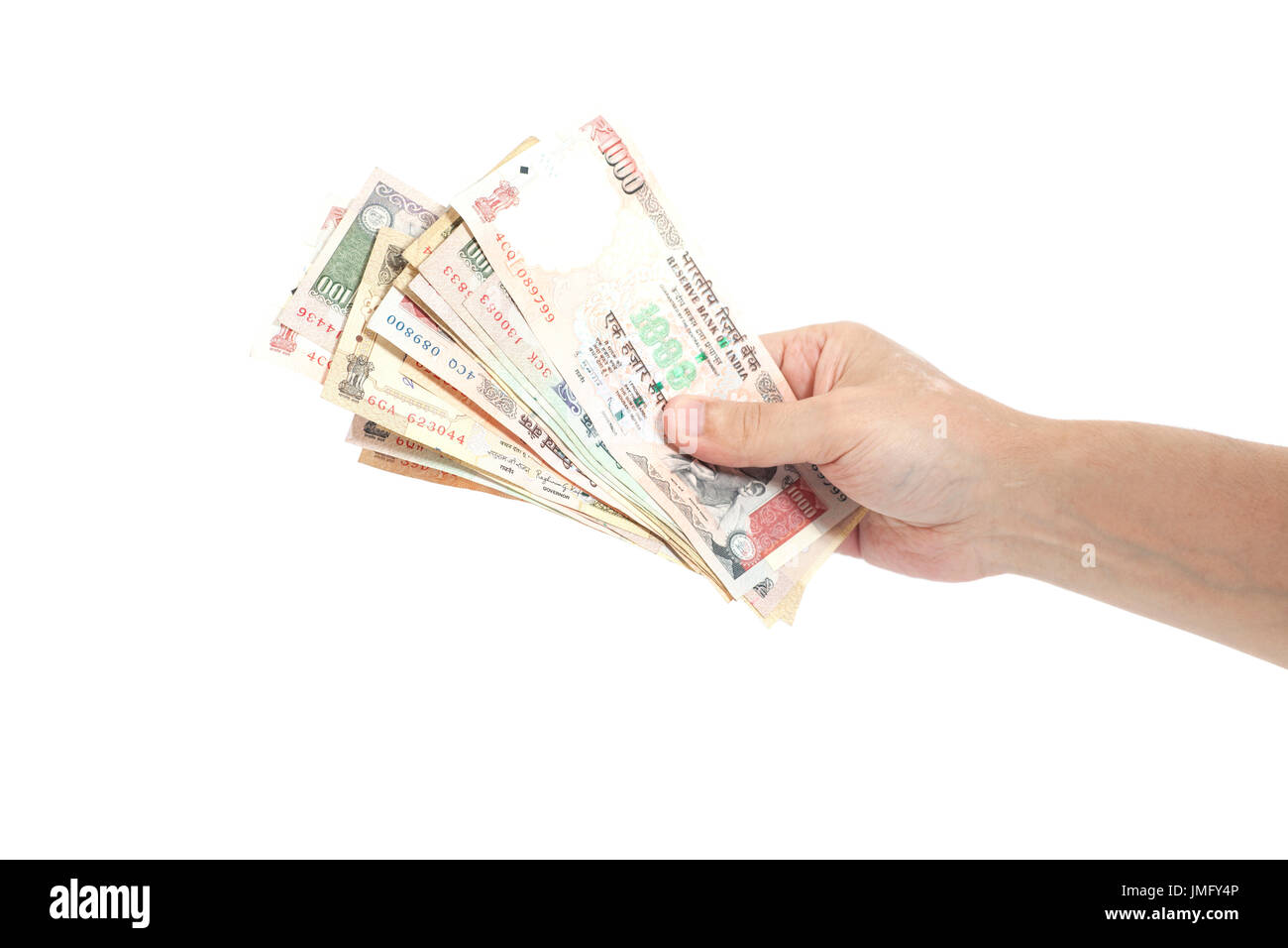 Hand holding Indian one thousand rupee notes Stock Photo - Alamy