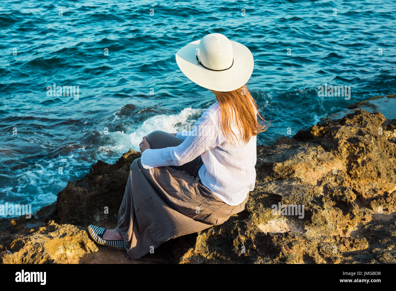 Clothes on rocks hi-res stock photography and images - Alamy