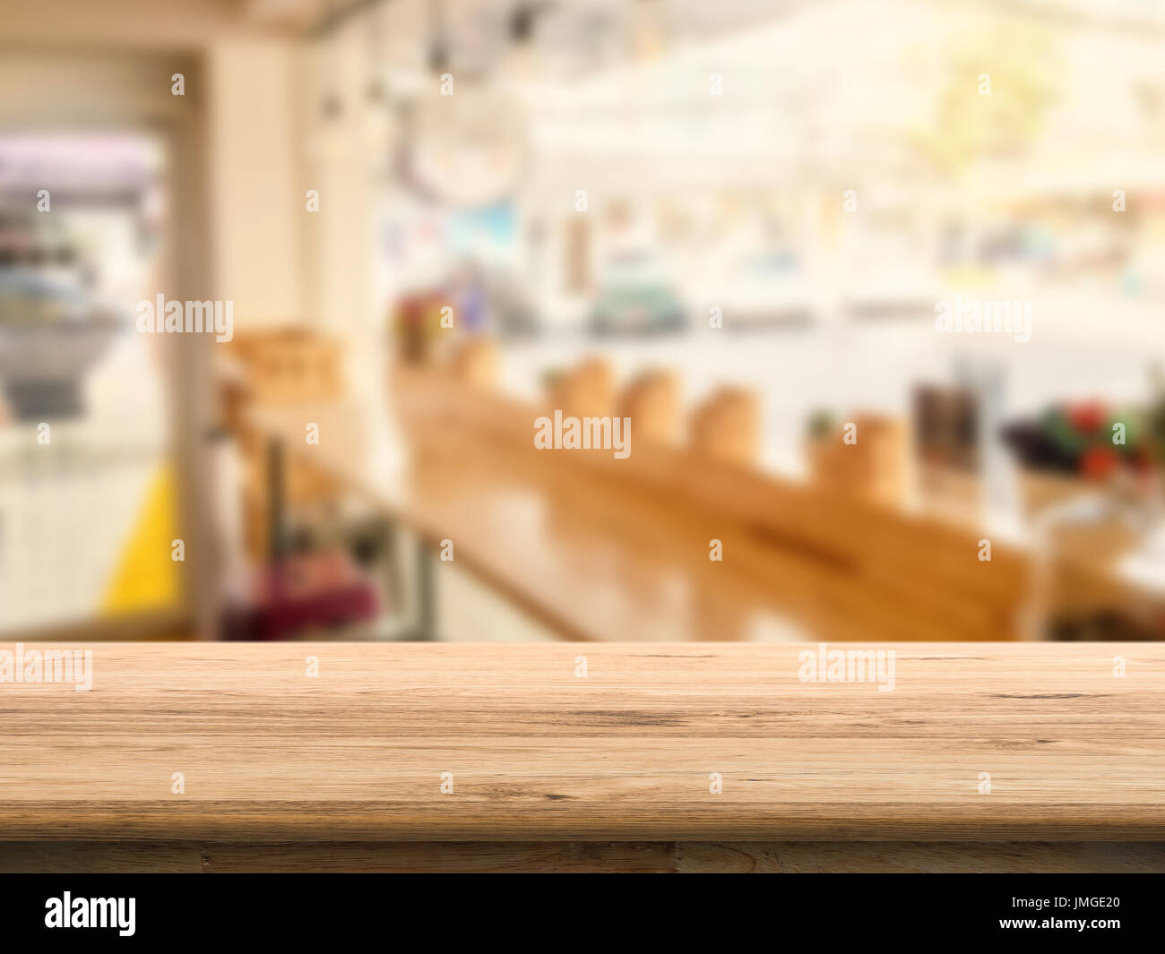 wooden table with empty restaurant background Stock Photo - Alamy