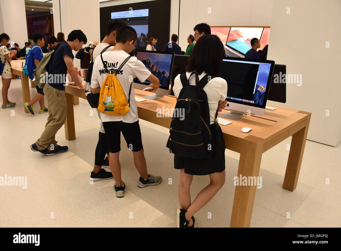 Customers on macs at the grand opening of the 1st Apple headquarters ...