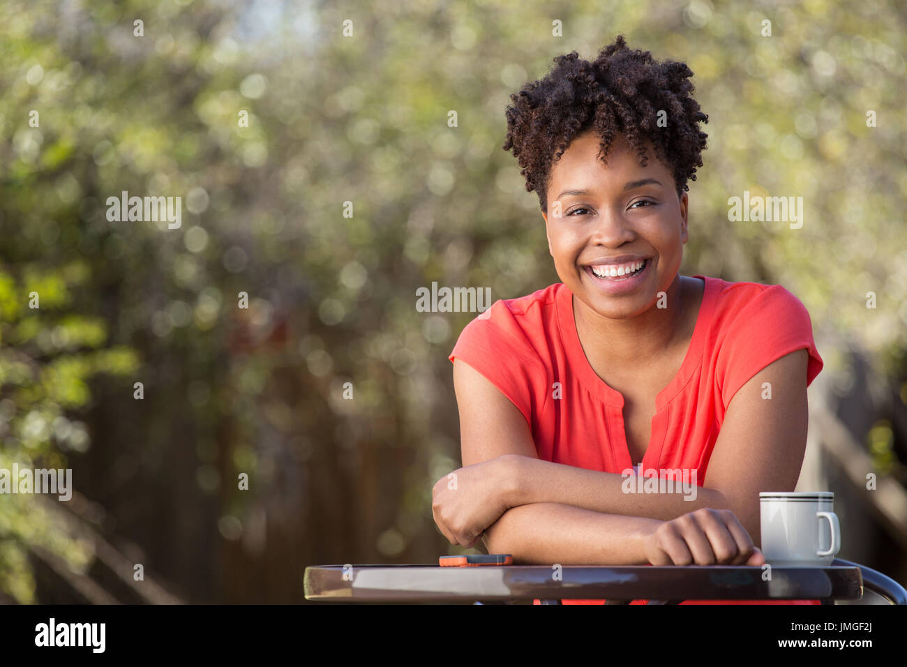 African woman outdoors content hi-res stock photography and images - Alamy