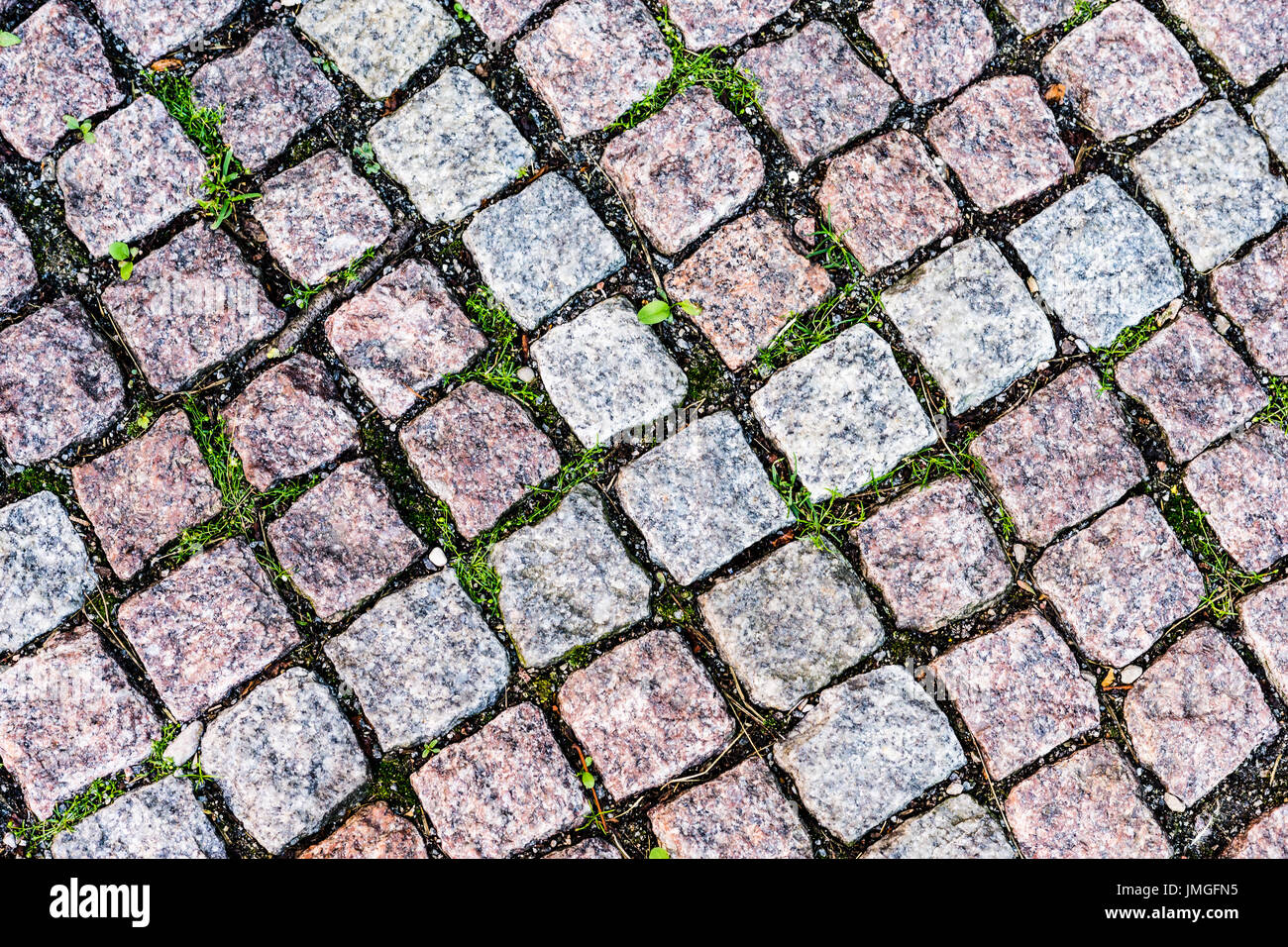 Texture of paved granite tiles road Stock Photo - Alamy