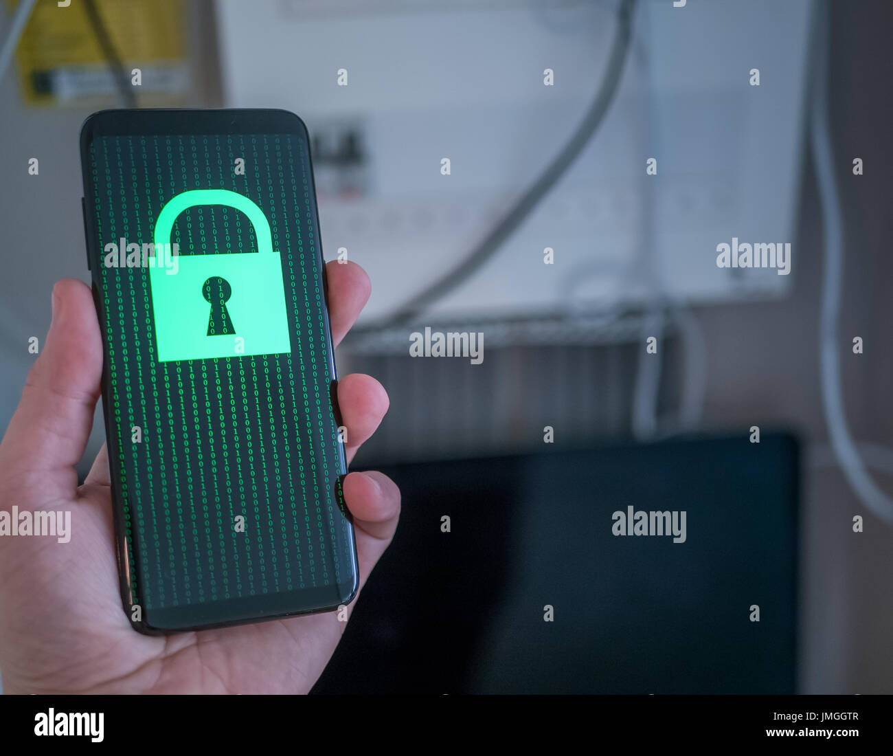 Man holding mobile phone with virus varning. Locked screen Stock Photo ...