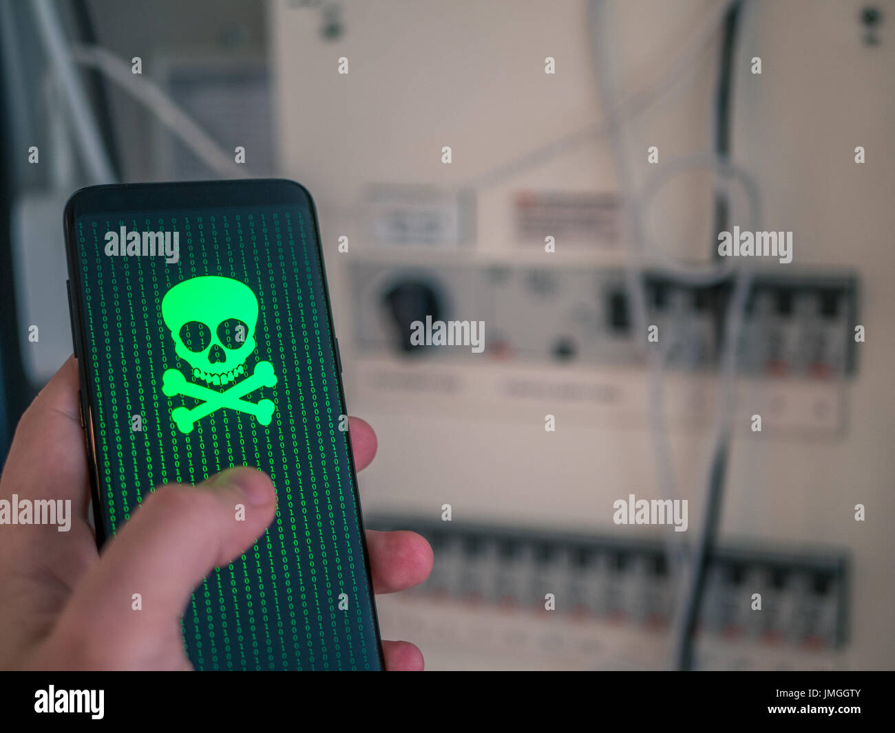 Hand holding mobile phone with hacker attack on screen. Smartphone ...