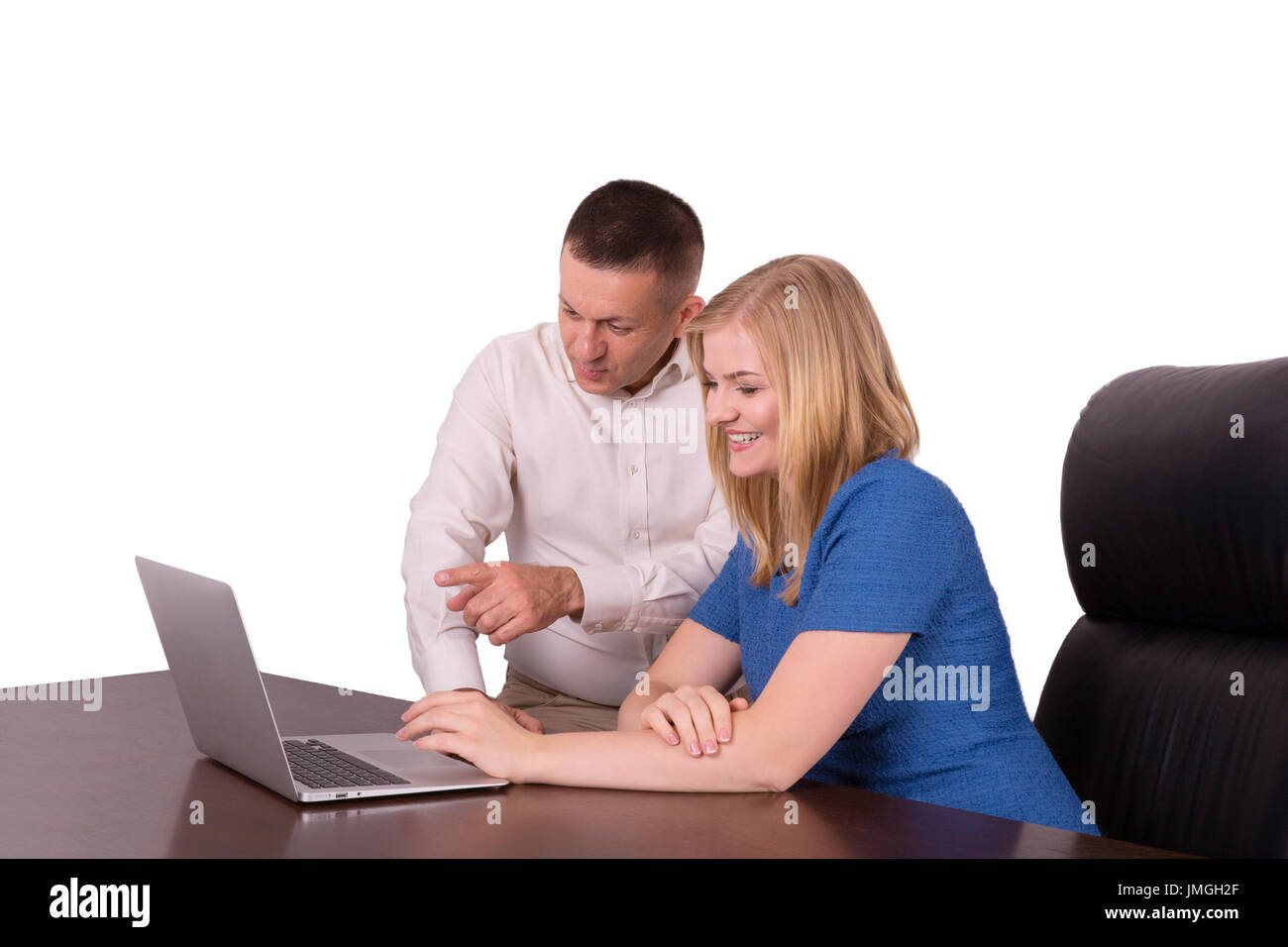 A man and woman looking at the computer screen isolated on white ...