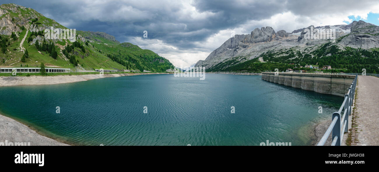 Glacial dam lake with clear cold water. Lago di Fedaia, Dolomites Stock ...