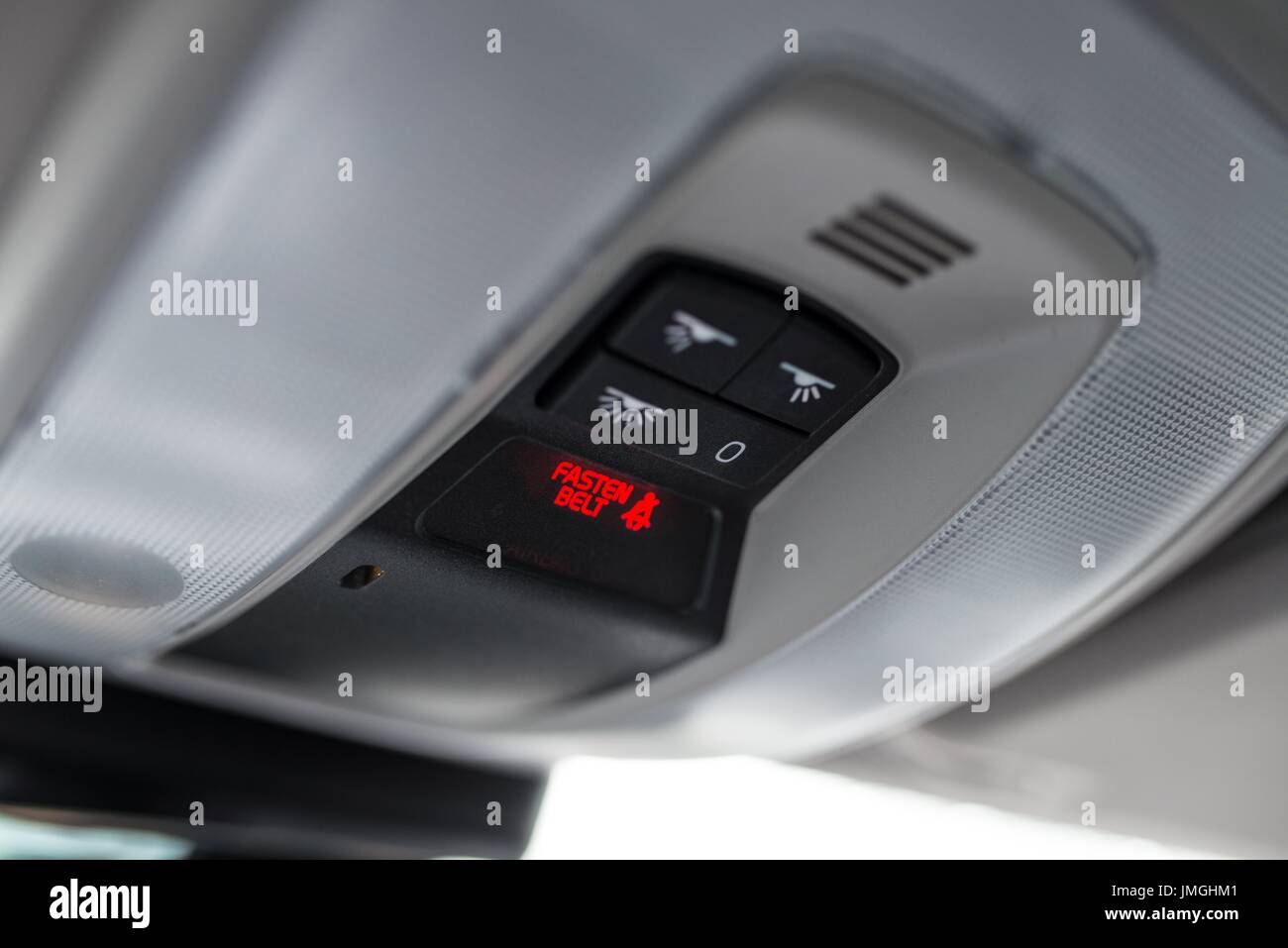 Fasten belt warning light on car dashboard Stock Photo - Alamy