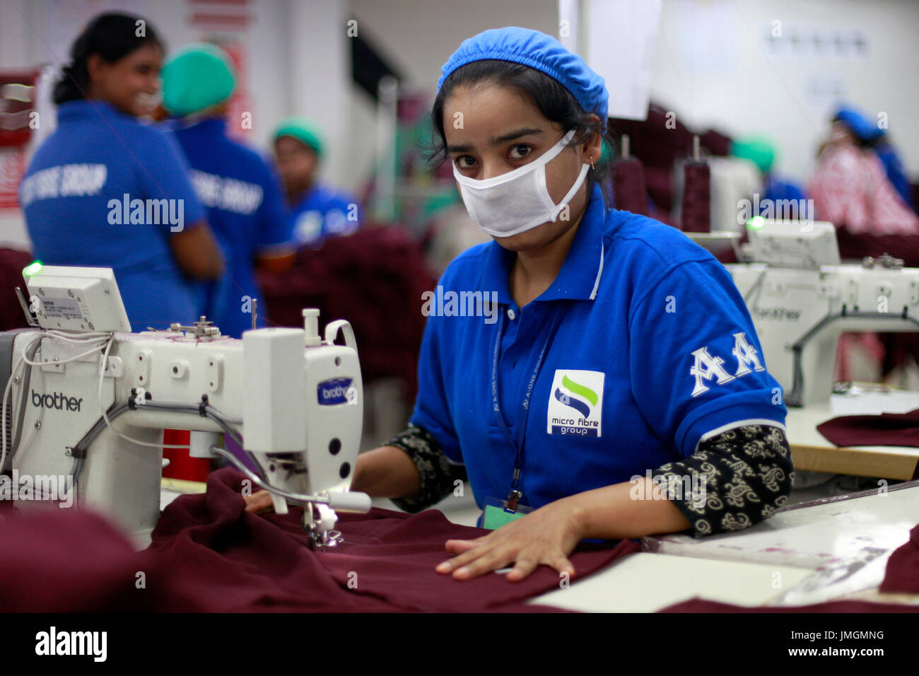 Female workers in sewing hi-res stock photography and images - Alamy