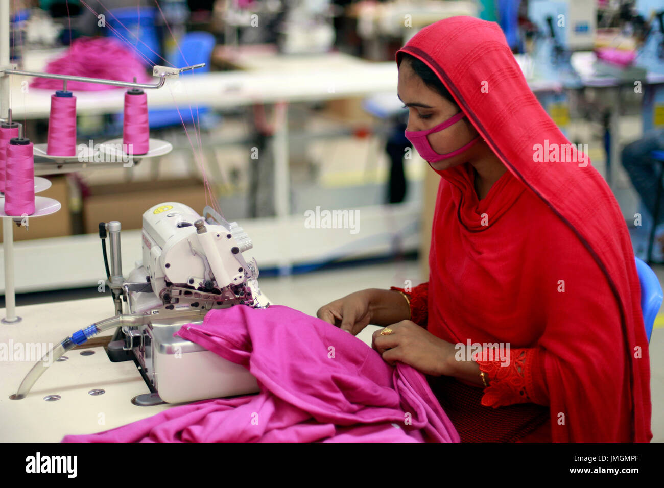 Female workers in a sewing section of a ready-made garment factory in ...