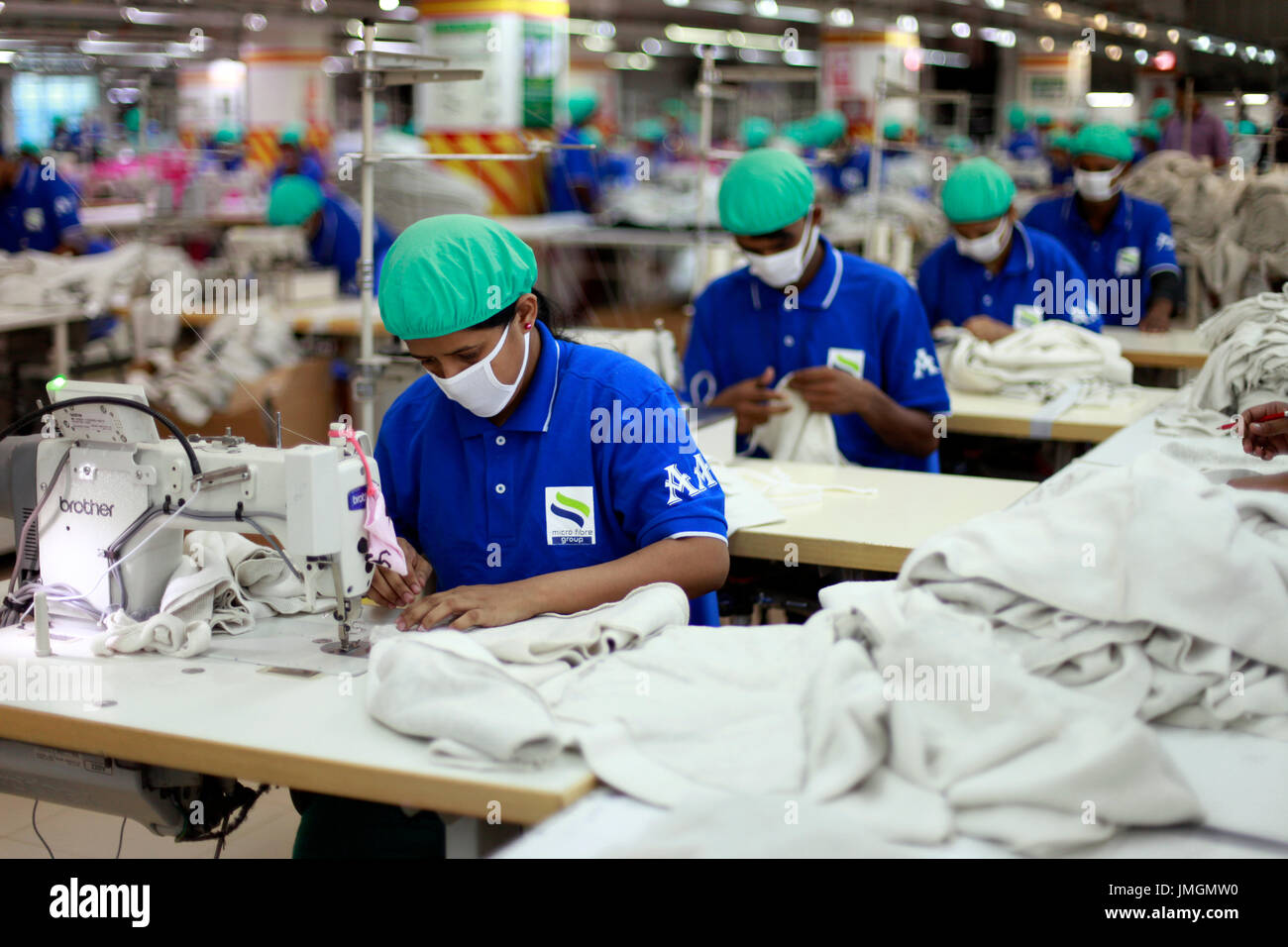 Female workers in a sewing section of a ready-made garment factory in ...