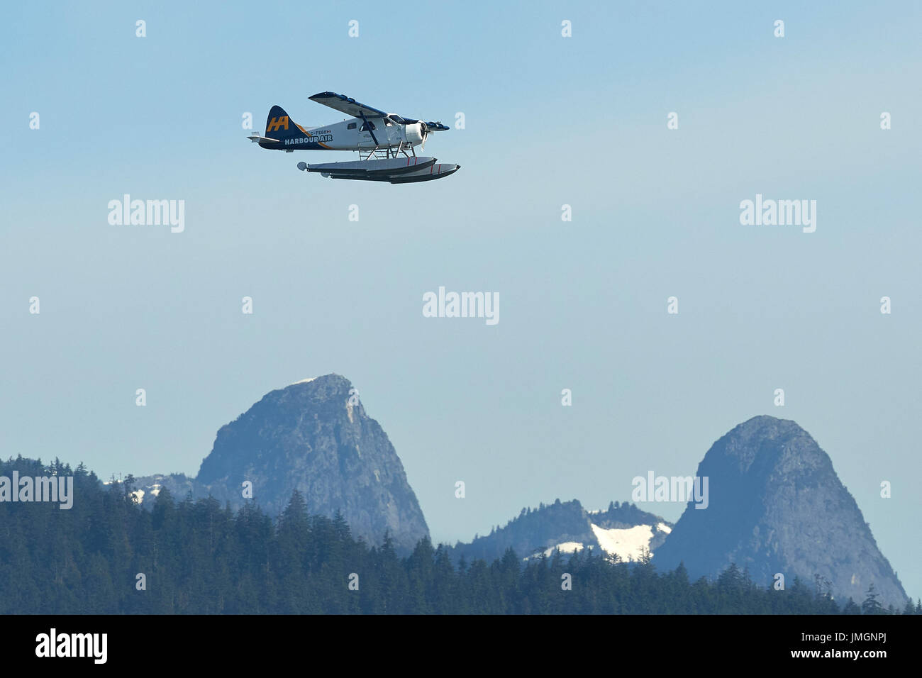 Vintage Harbour Air de Havilland Beaver Floatplane Flying Over British ...