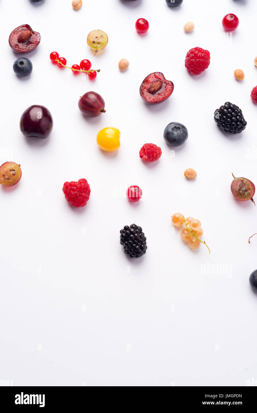 Picture of mix of berries isolated over white background table Stock ...