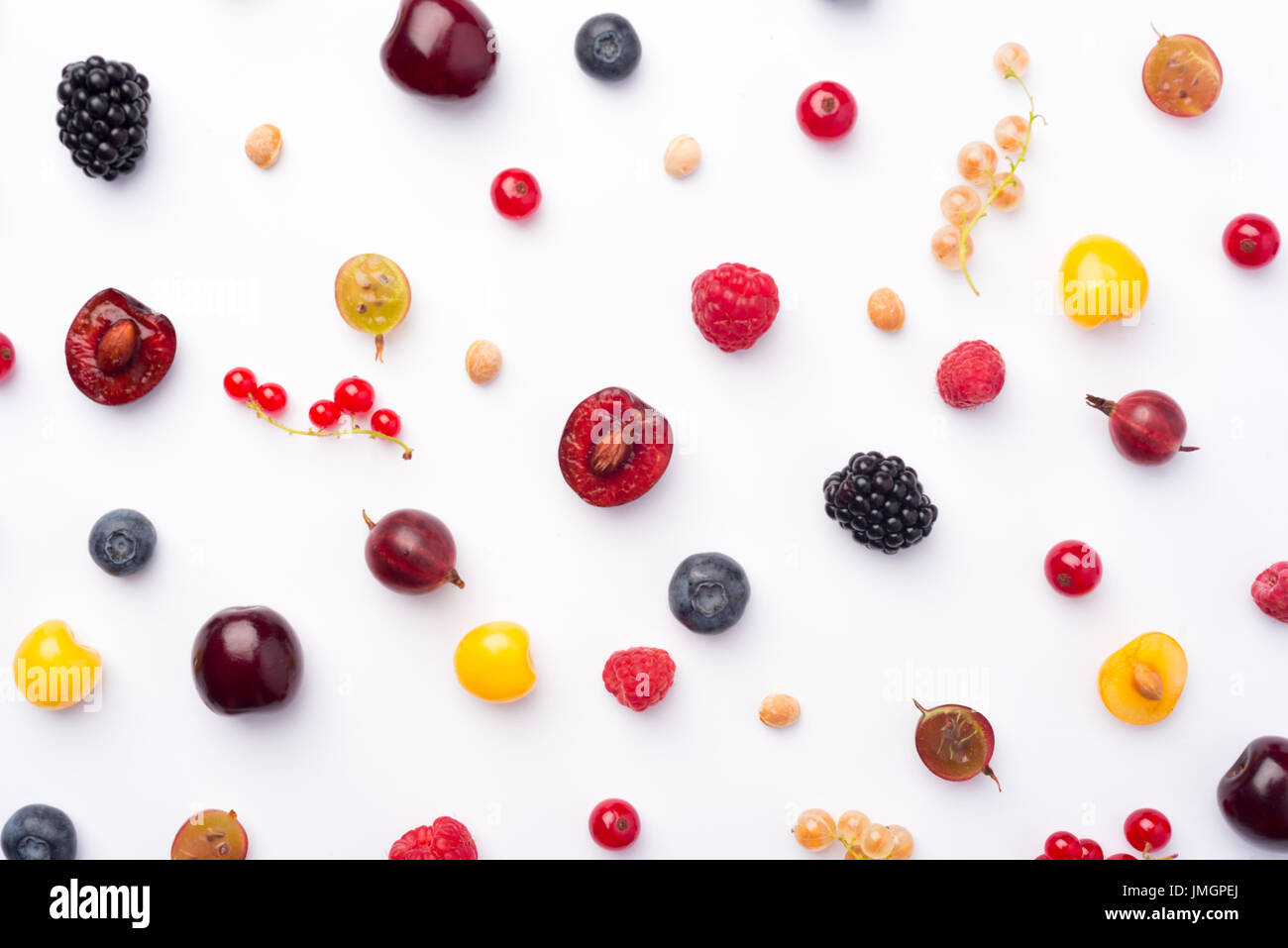 Photo of mix of berries isolated over white background table Stock ...