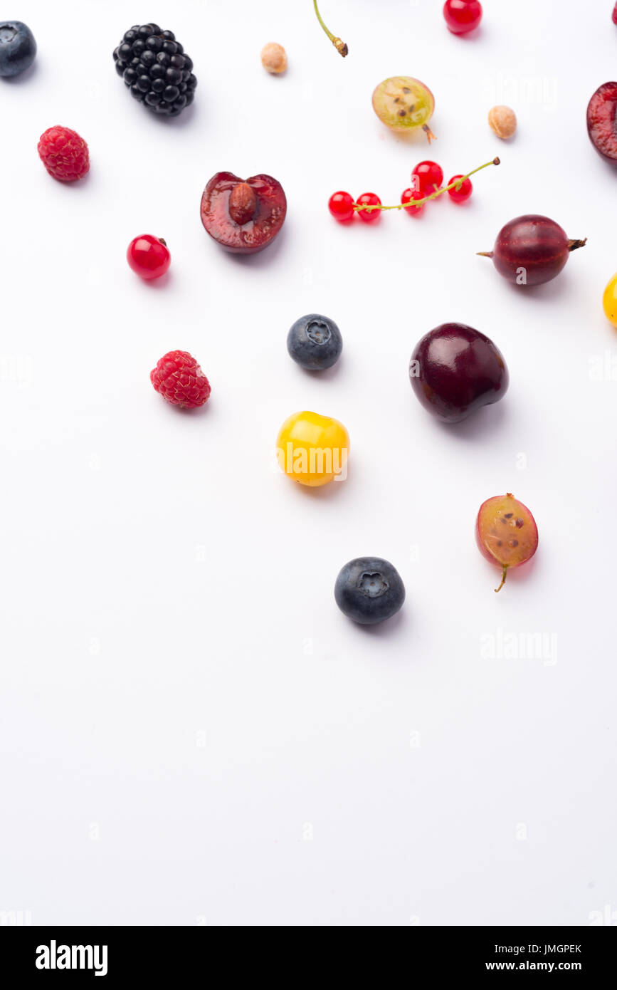Picture of mix of berries isolated over white background table Stock ...