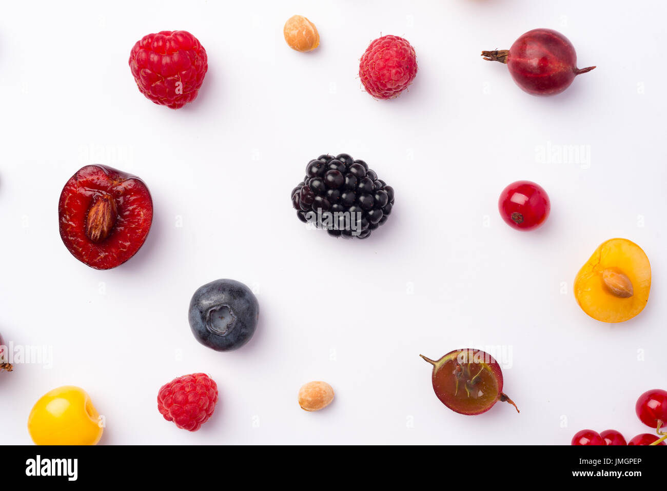 Picture of mix of berries isolated over white background table Stock ...