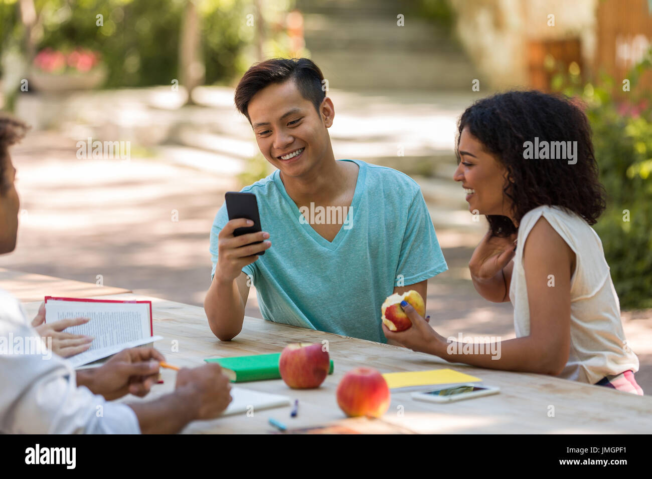 College students talking using phone hi-res stock photography and images - Alamy
