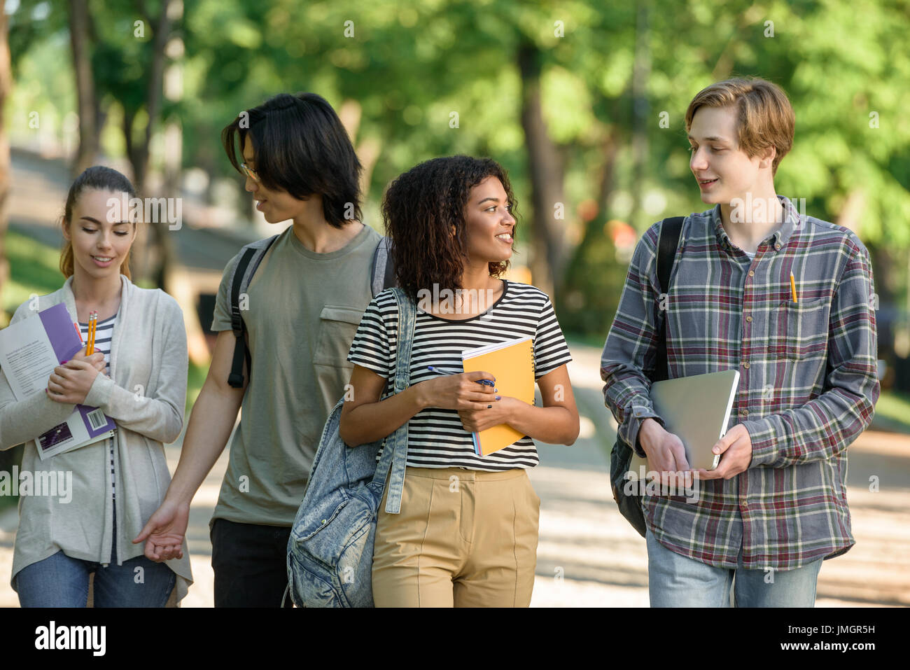 Group talking happy gesture hi-res stock photography and images - Alamy