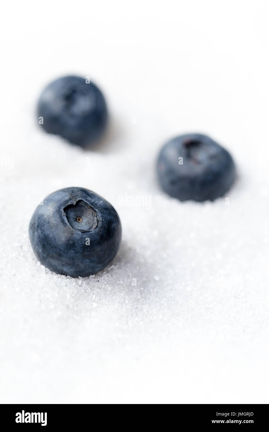 Picture of sweet blueberries isolated over white sugar background Stock ...