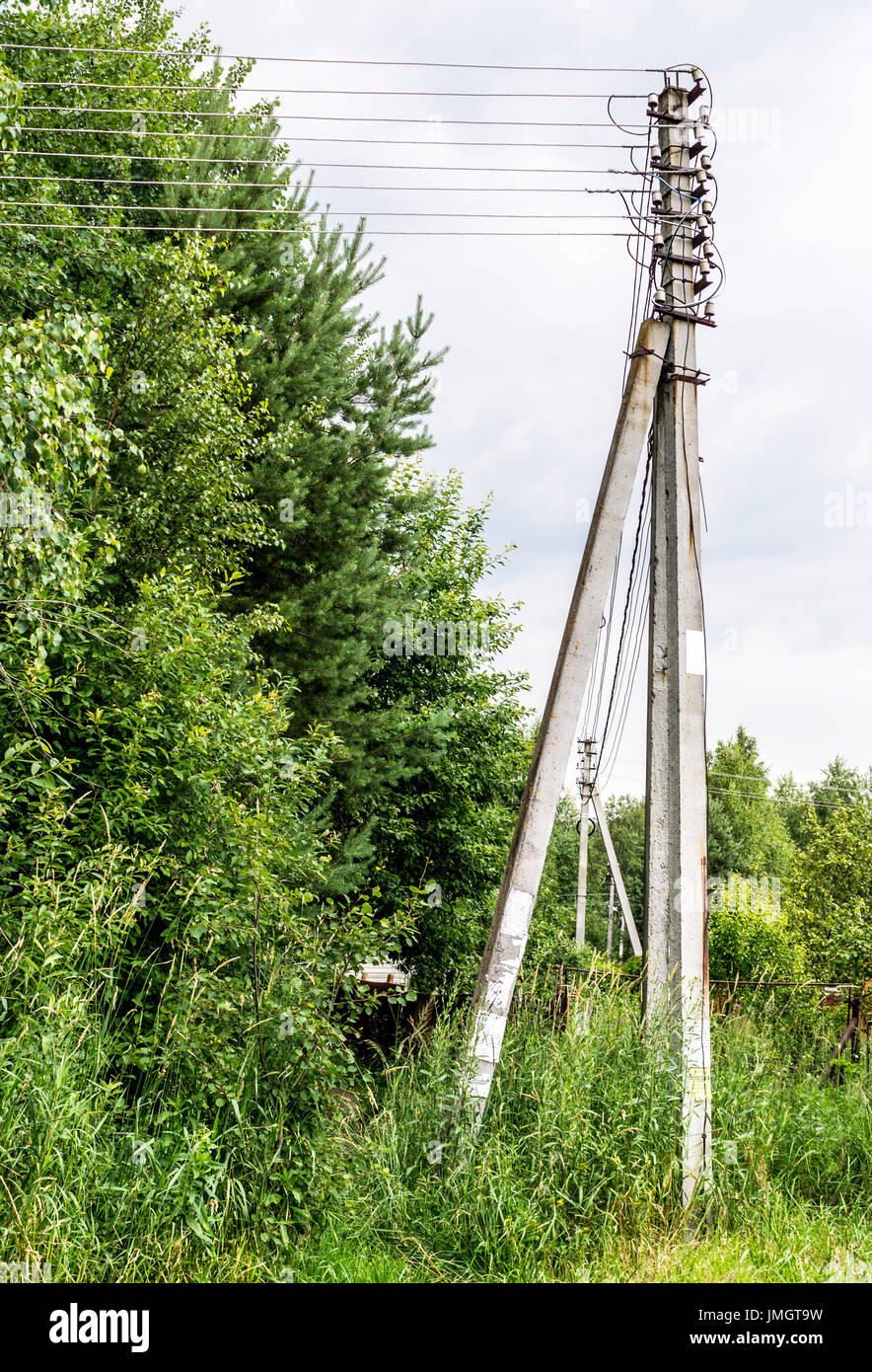gray powerline pillar near the forest. background, nature Stock Photo ...