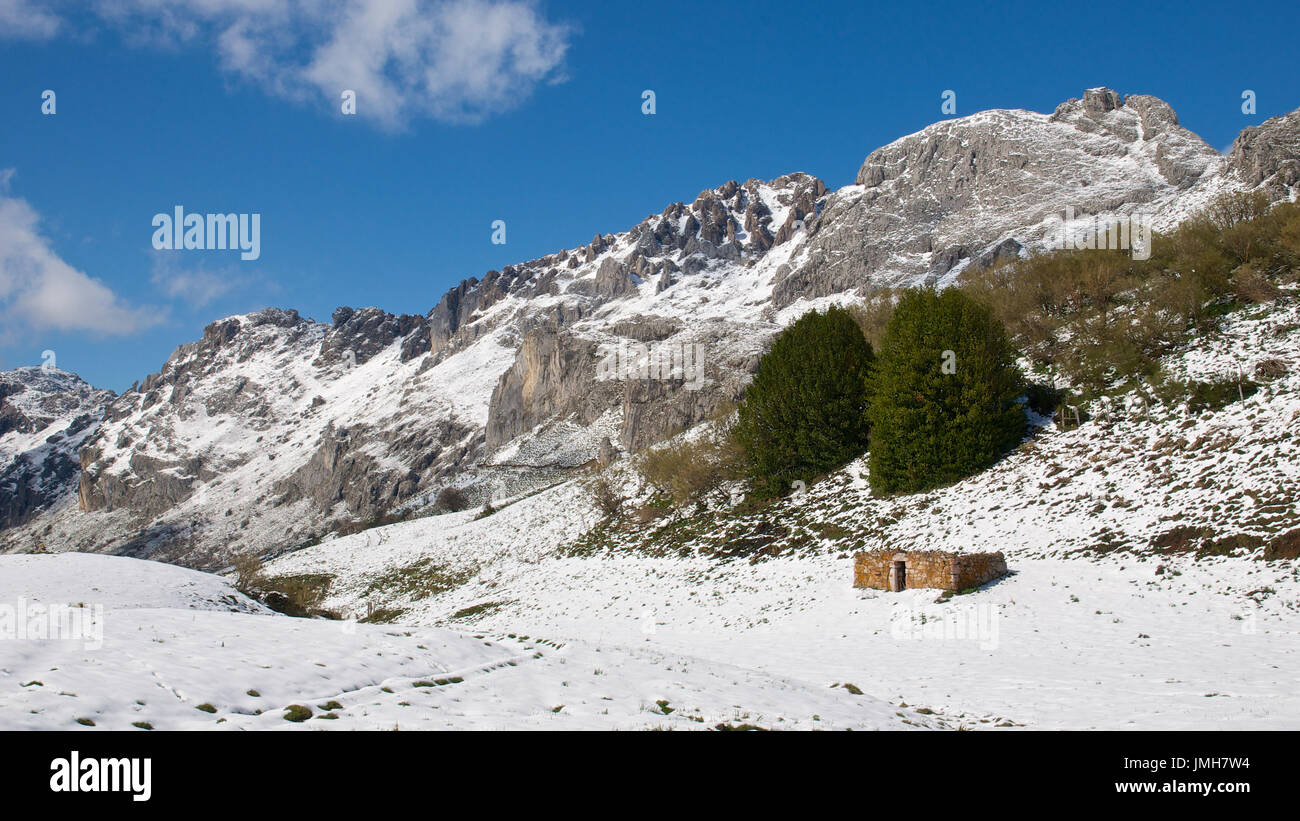 A snowy panoramic view of a teito, which is a typical hut, and ...