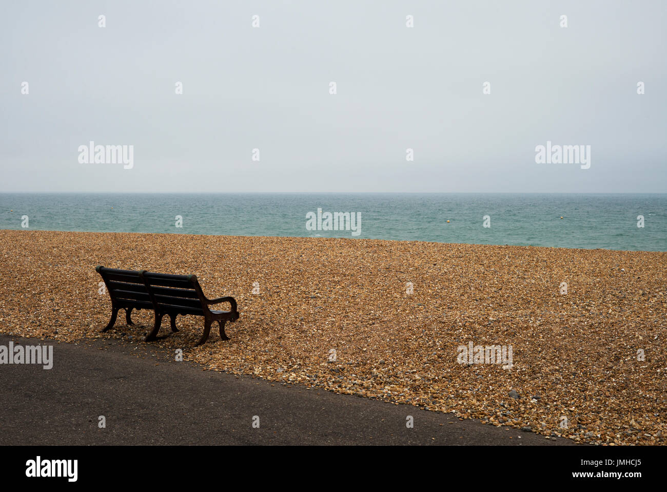 Bench on the beach hi-res stock photography and images - Alamy